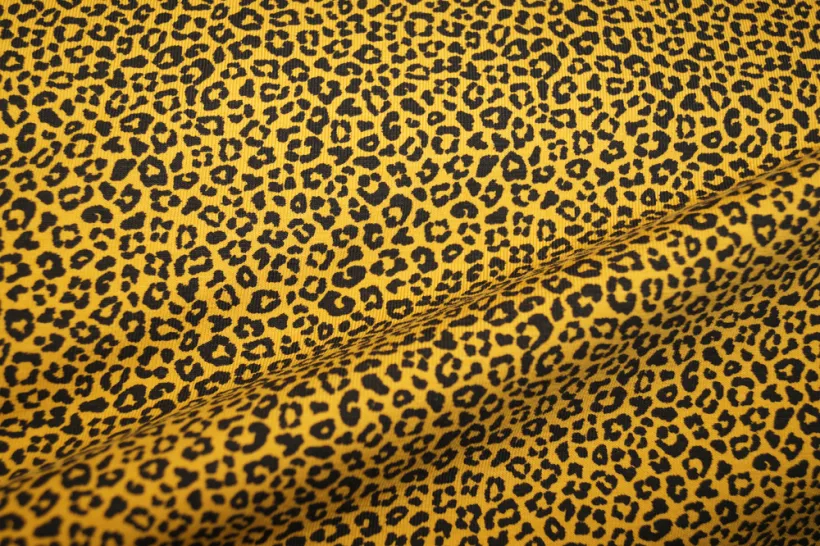 Tricot stof - kleine dierenprint - oker - 1375-033 - De Stoffenkraam ...